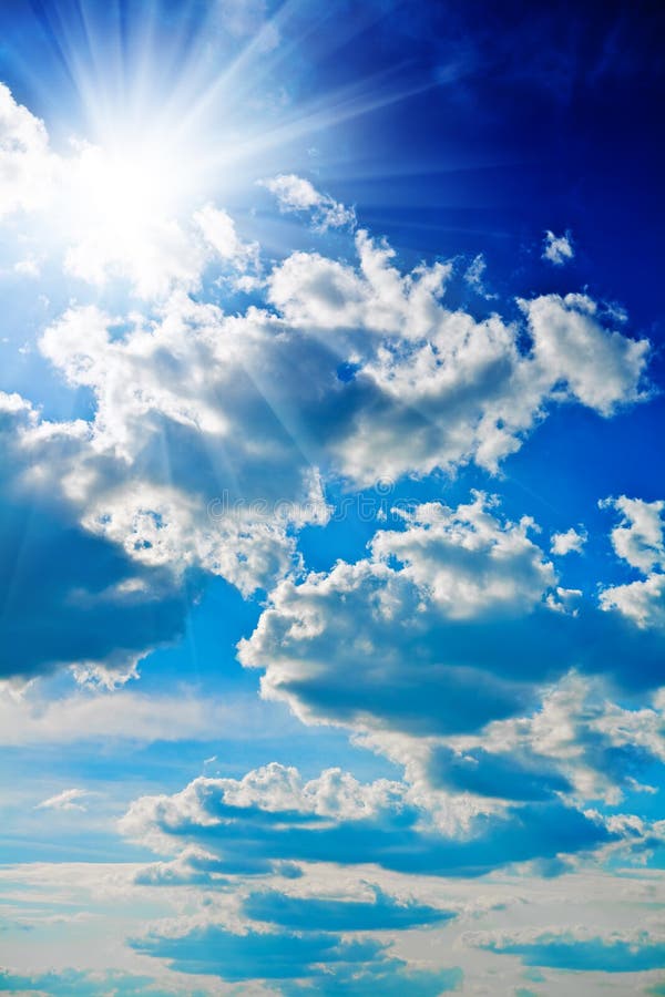 Blue Sky with Sun and Clouds Stock Photo - Image of shiny, brightly ...