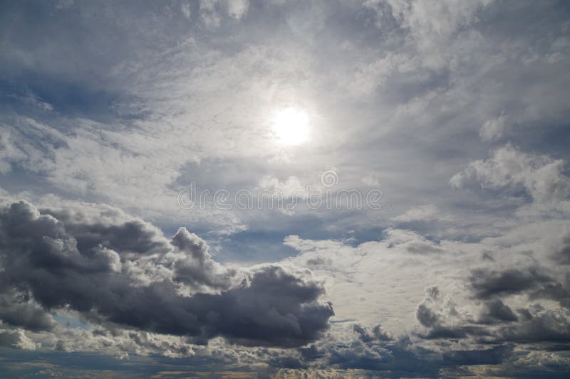 Blue Sky with Sun and Mixed Clouds on Different Layers, Above Horizon ...