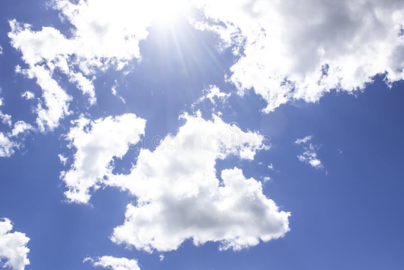 A Blue Sky with a Sunlight. Cloud in the Blue Sky with God Lights. a ...