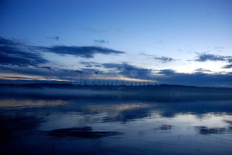 Blue sky at sunset stock image. Image of still, ocean - 7549633