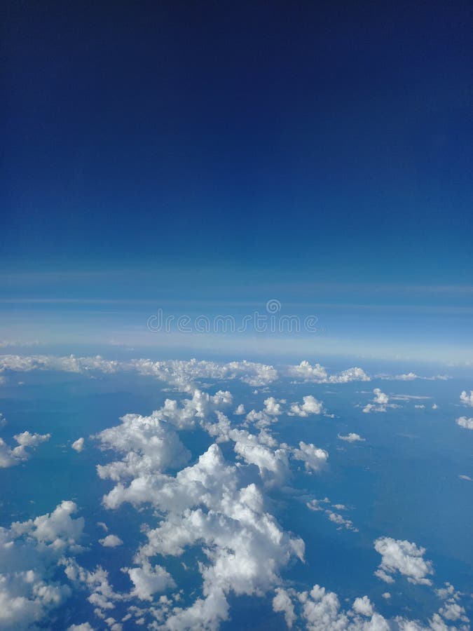 Blue Sky View from My Seat on the Plane Stock Photo - Image of wave ...