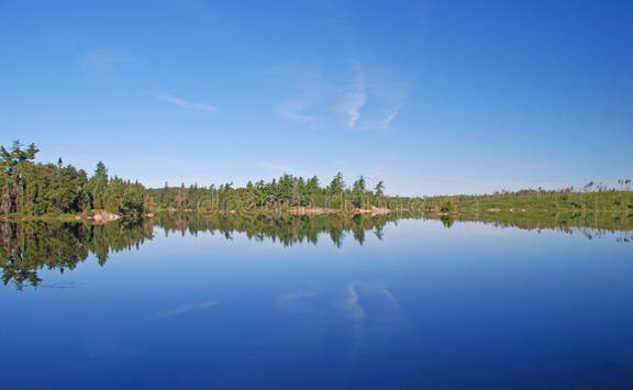 Blue Sky and Water stock photo. Image of blue, saganagons - 19136350