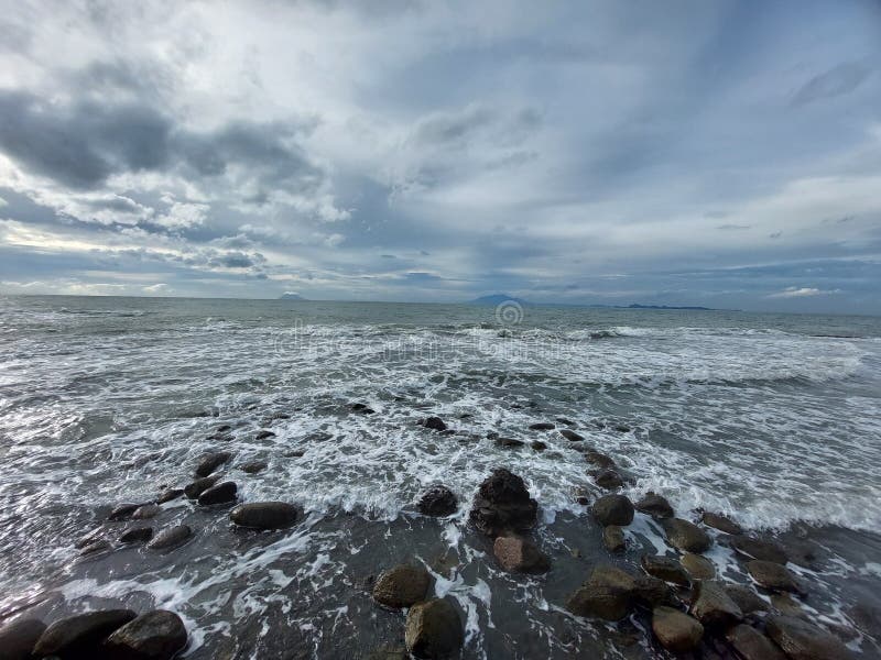 The Blue Sky and the Wave of the Ocean at Anyer Beach Stock Photo ...