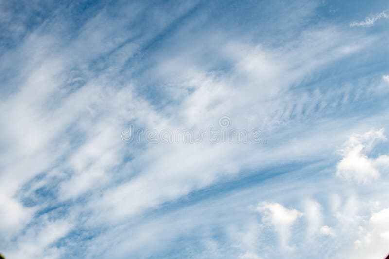 Blue Sky with Wavy Stratus and Cumulus Clouds Stock Photo - Image of ...