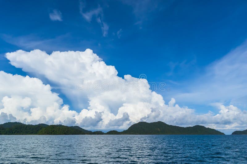 Blue Sky with White Cloud and Deep Blue Sea Stock Photo - Image of ...