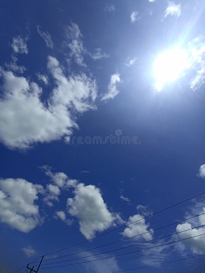 Blue Sky, White Cloud in the Sky, Power Pole, Cable, Sun Stock Photo ...
