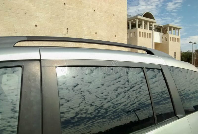 Blue Sky with White Clouds, Reflecting in Window of Car Stock Image ...