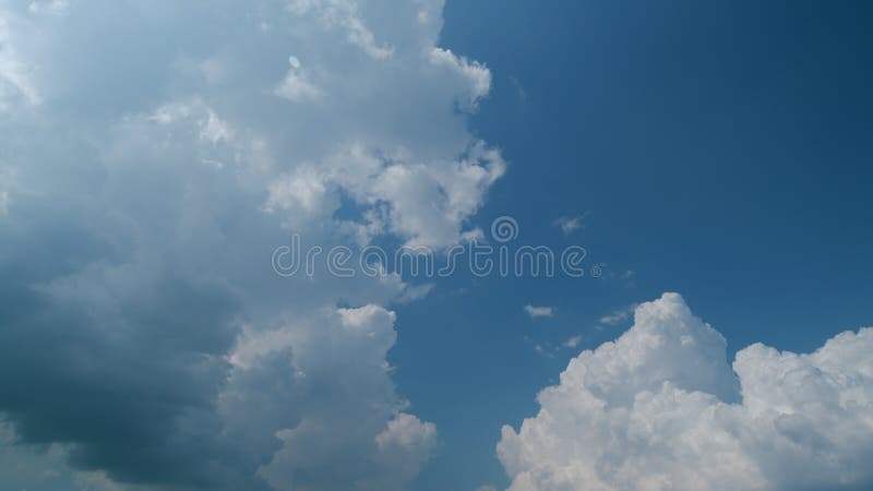 Blue Sky White Clouds. Thunderstorm Summer Cloud and a Blue Sky. Moving ...