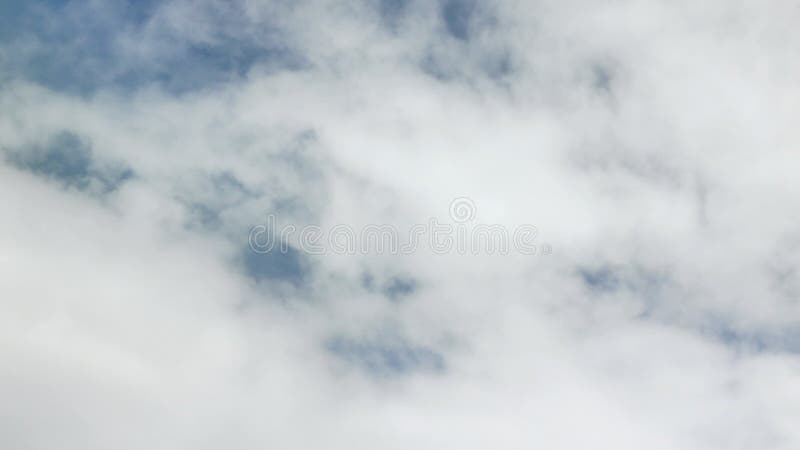 Blue Sky with White Fluffy Clouds from Airplane Flight Fly Over the ...