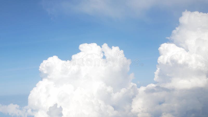 Blue Sky with White Fluffy Clouds from Airplane Flight Fly Over the ...