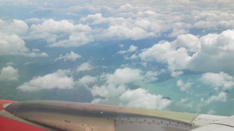 Blue Sky with White Fluffy Clouds from Airplane Flight Fly Over the ...