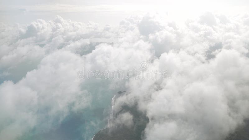 Blue Sky with White Fluffy Clouds from Airplane Flight Fly Over the ...