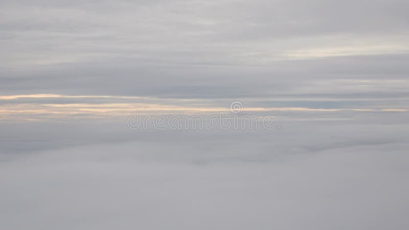 Blue Sky with White Fluffy Clouds from Airplane Flight Fly Over the ...
