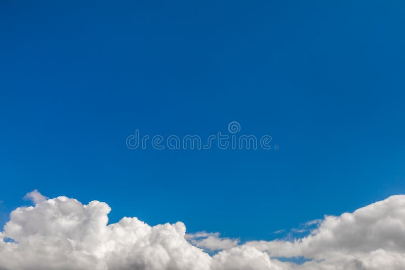 Blue Sky with White Fluffy Clouds at the Bottom Stock Photo - Image of ...