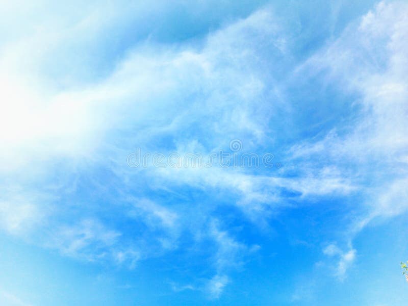 Blue Sky with Wispy Clouds stock photo. Image of breezy - 376482174