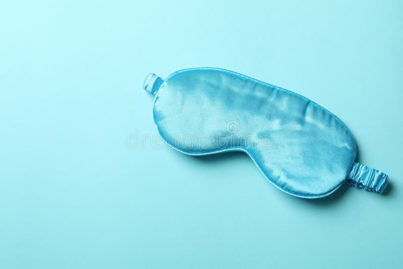 Blue Sleep Mask on Blue Background, Space for Text Stock Image - Image ...