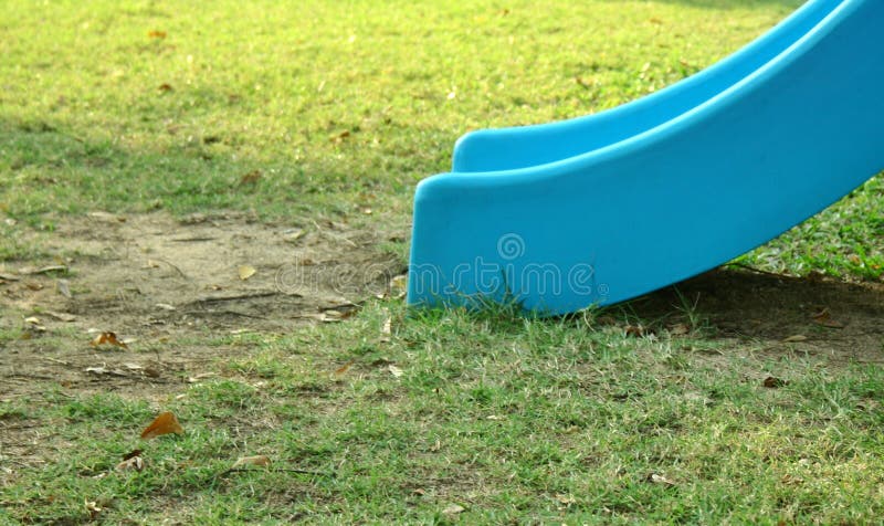 Blue slide in the park stock photo. Image of childhood - 32845936