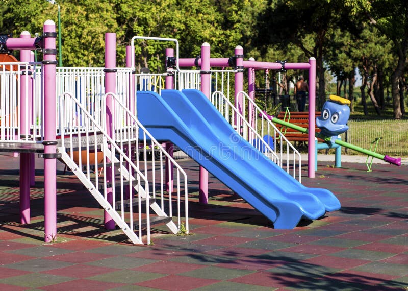 Blue slide in the park stock photo. Image of childhood - 32845936