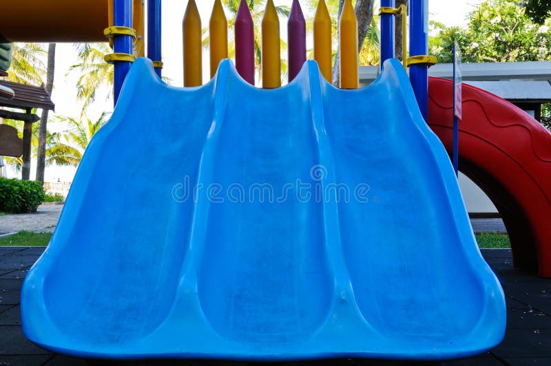 Blue Slider for Kids at Colorful Playground Stock Photo - Image of game ...
