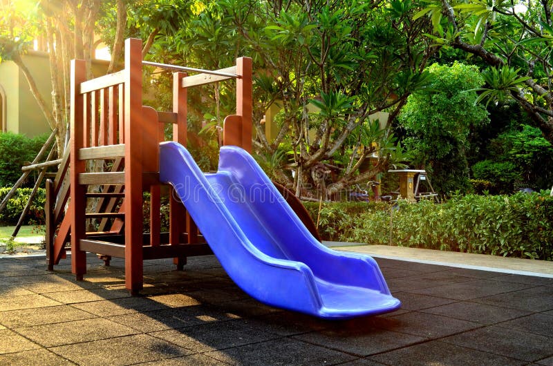 Blue Slider for Kids at Colorful Playground Stock Photo - Image of game ...