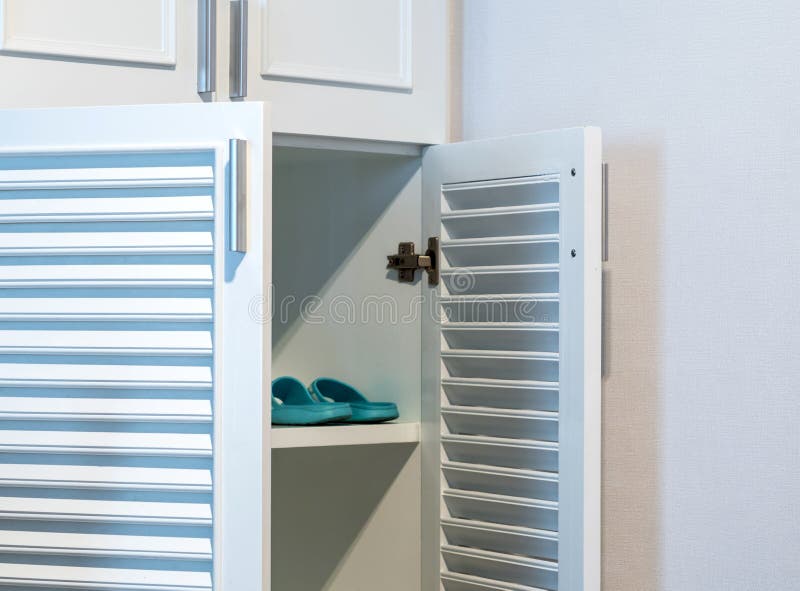 Slipper in Shoe Cabinet that Open the Door To Leave Stock Photo - Image ...