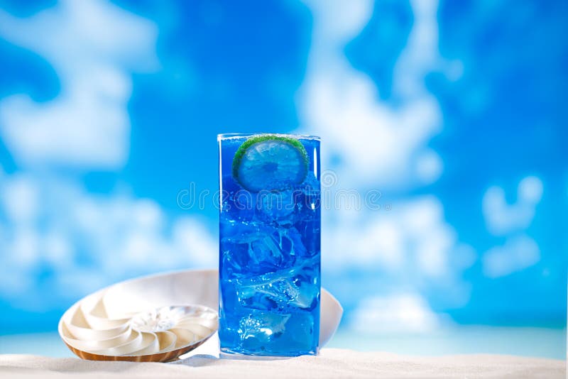 Blue Slush Ice in Glass on Sea Beach Background Stock Image - Image of ...