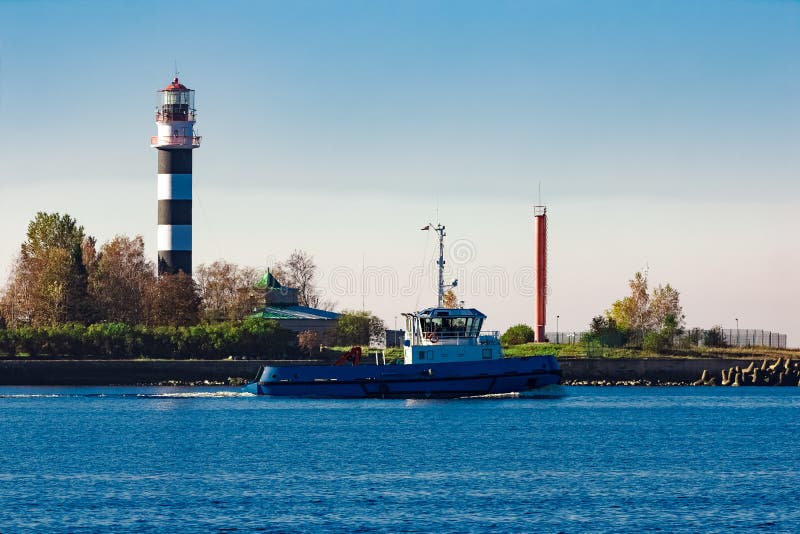 Blue small tug ship stock image. Image of riga, towboat - 88609101