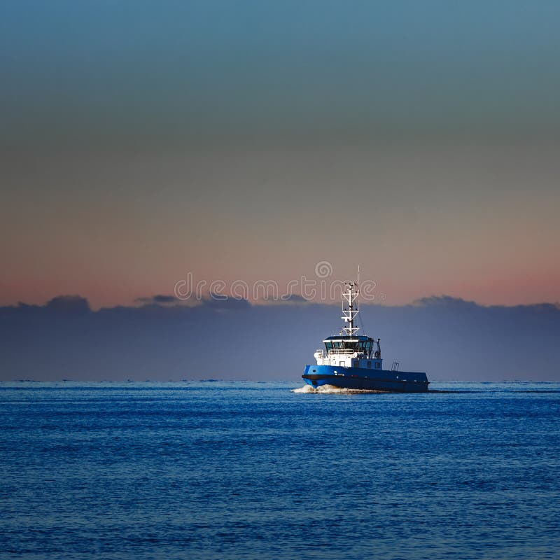 Blue small tug ship stock image. Image of towing, pushing - 88471335