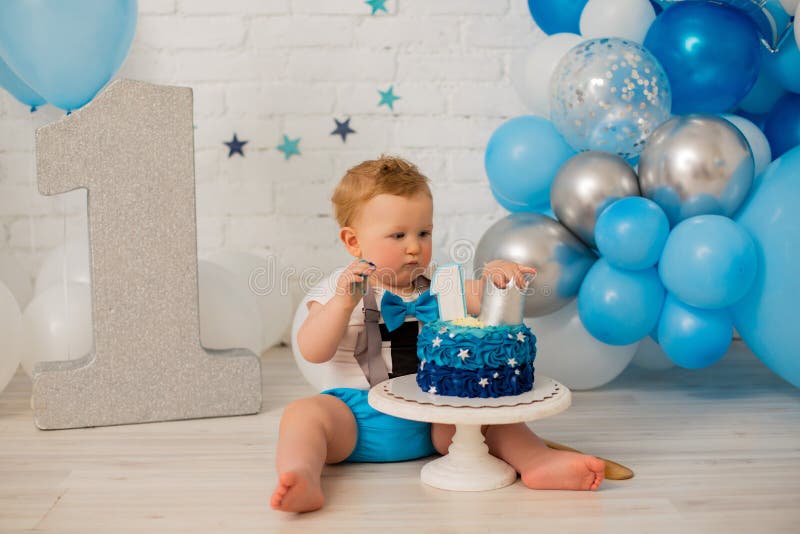 Blue smash cake with stars stock photo. Image of holiday - 195673062