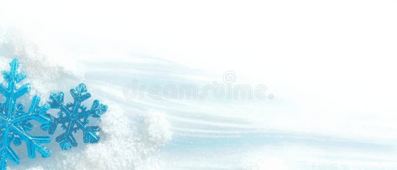 A Blue Snowflake Atop a Snow-piled Mound, upon White-covered Ground ...