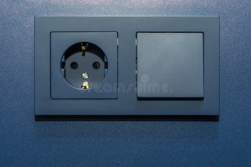 Blue Socket and Switch on the Wall. Construction, Renovation and ...