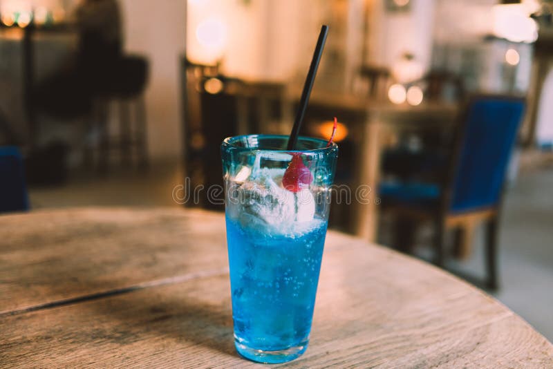 Blue soda drink stock photo. Image of hand, sorbet, fresh - 216996240