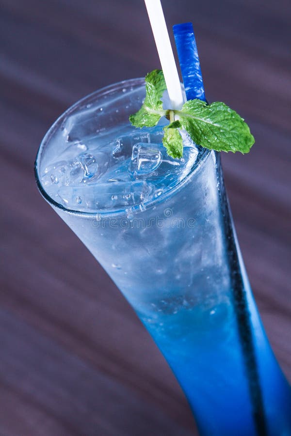Blue soda stock image. Image of glass, straw, leave, soda - 44724745