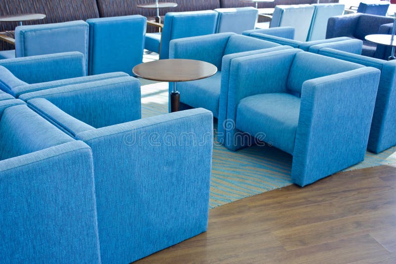 Blue Soft Armchairs and Sofas and Round Wooden Tables in the Hot Stock ...