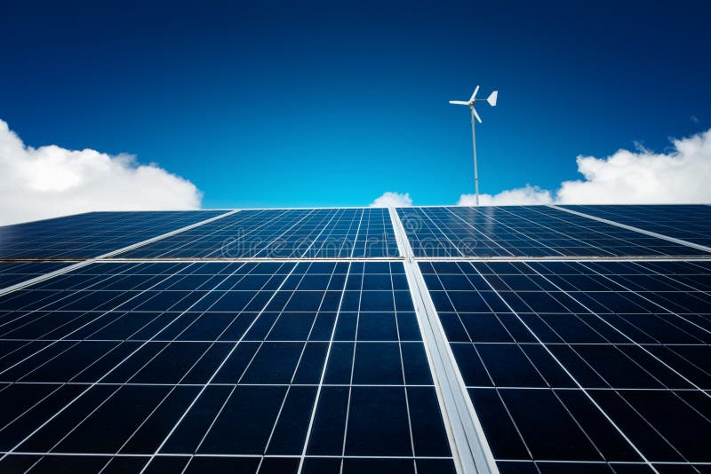 Blue Solar Panel with Wind Turbine on Blue Sky Stock Image - Image of ...