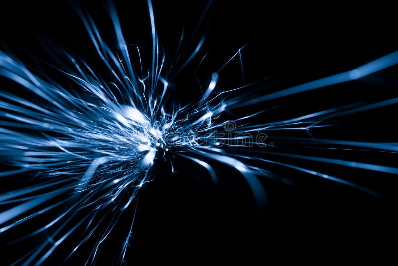 Blue Sparks from the Grinder Glowing in the Dark Stock Photo - Image of ...
