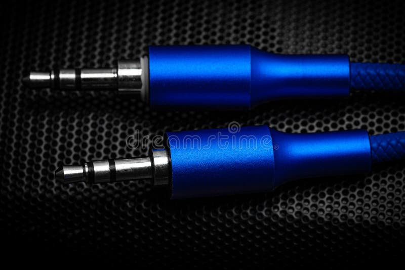Blue Speaker Cable Jack Against a Dark Background Stock Image - Image ...