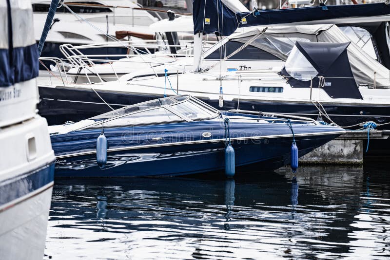 Blue Speed Boat Moored Parked in Port Editorial Photography - Image of ...