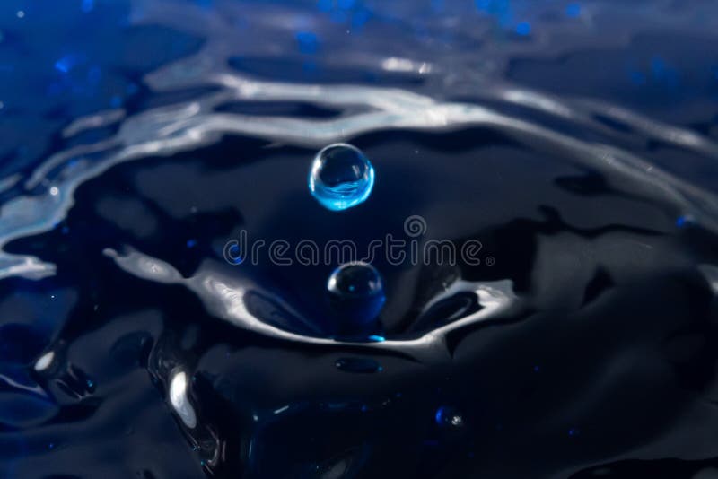 Blue Splashes of Water Drops on Background Texture. Macro Stock Image ...
