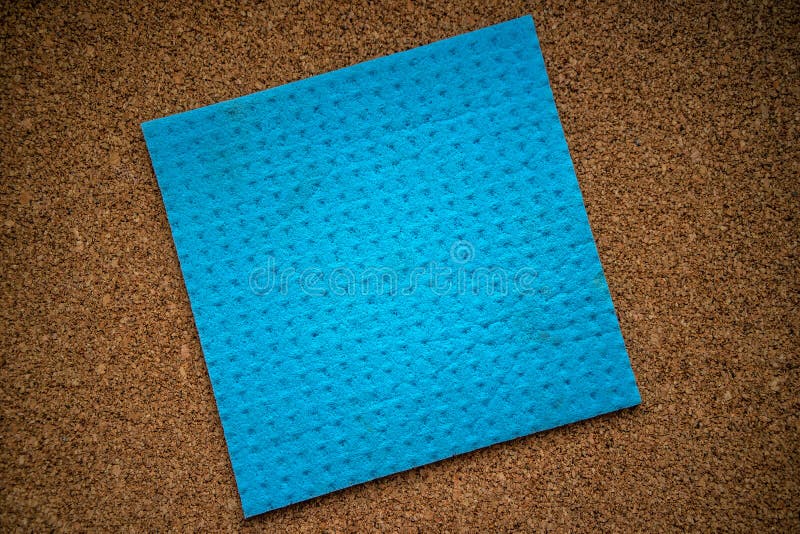 Blue Sponge for Dishes on the Cork Table Stock Illustration ...
