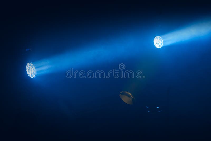 Blue Spot Lights with Rays in Smoky Dark Stock Image - Image of concert ...