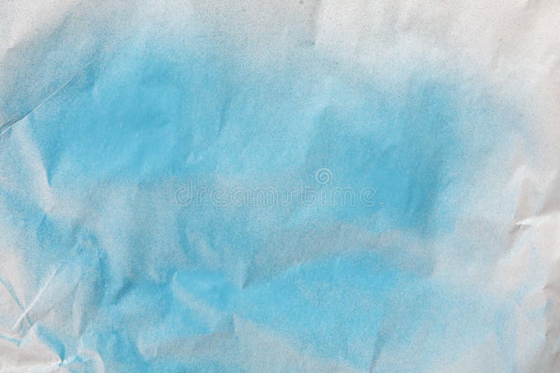 A Blue Spray Paint on a White Colored Paper Background Stock ...