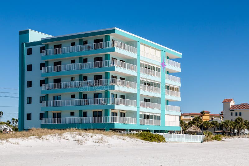 Blue Square Beach Condos stock image. Image of palm, coast - 70652063