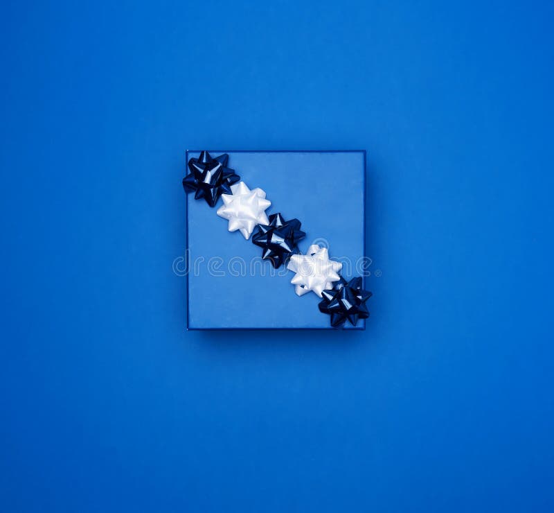 Blue Square Box with a Gift with a Bow on a Blue Background Stock Image ...