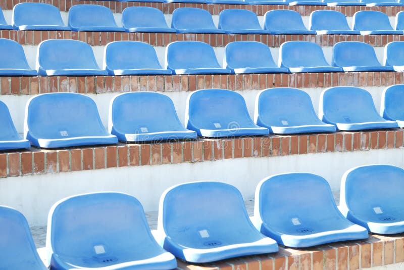 Blue stadium seats stock image. Image of pattern, flag - 87424131