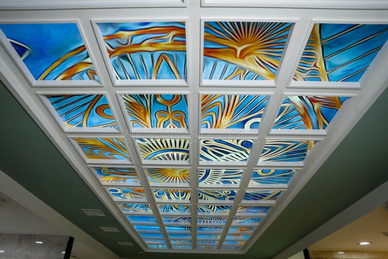 Blue Stained Glass on the Ceiling in a White Frame with Colorful Hand ...