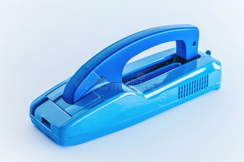 A Blue Stapler Placed on a Clean White Surface for Easy Use Stock Photo ...