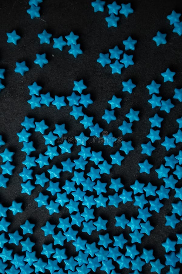 Blue Star Sugar Sprinkles Scattered on Dark Stock Image - Image of ...