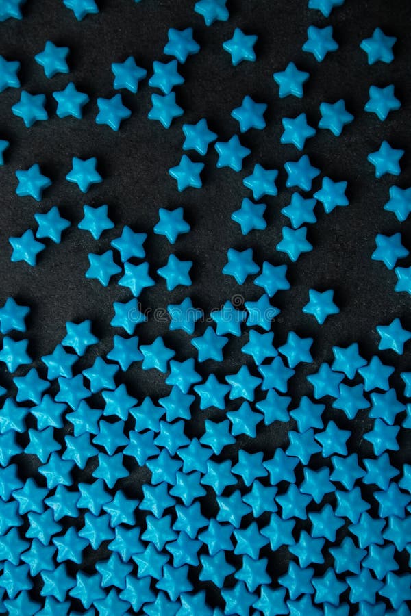 Blue Star Sugar Sprinkles Scattered on Dark Stock Image - Image of ...