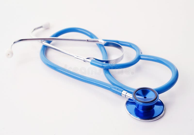 Blue Stethoscope in Doctors Coat Stock Photo - Image of vertical ...